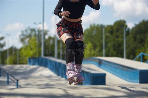 Young Skater Girl Riding In A Skatepark Aggressive Inline Roller Blader Female Skating In A