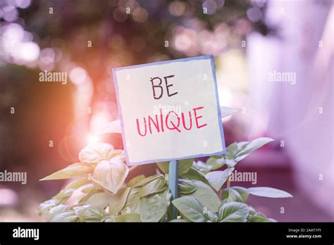 Conceptual Hand Writing Showing Be Unique Concept Meaning Being The