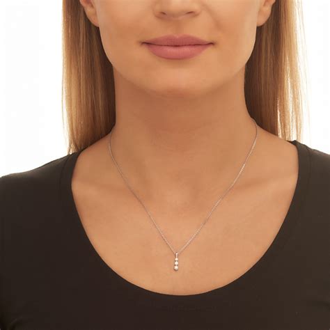 Trilogy 030ct Diamond Pendant In 9k White Gold