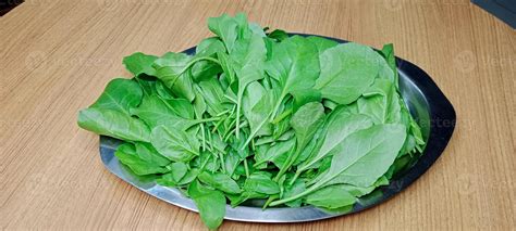 Bunch Of Fresh Spinach Indian Palak Leaf Piled Up On The Market Ready To Be Sold Or Making Curry