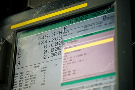 CNC Machine Monitor Display With Program Code Running And Numbers With Parameters Changing