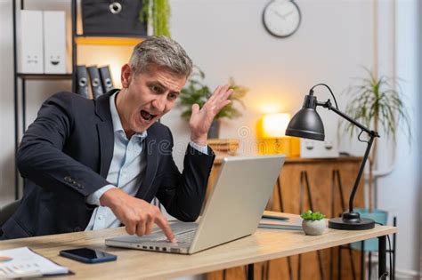 Frustrated Caucasian Young Entrepreneur Having Software Problems With