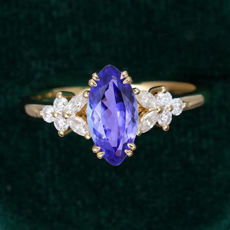 Marquise Cut Tanzanite Engagement Ring In Yellow Gold Mollyjewelryus