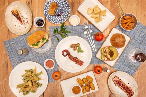 Set Of Dishes Of Spanish Recipes And Tapas With A Modern Touch Cod