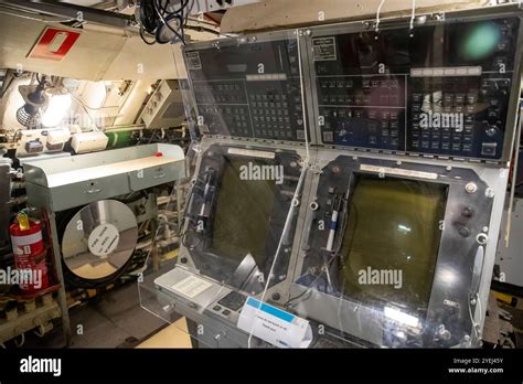 Interior View Of A Submarines Control Station Showing Multiple Large