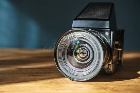 Camera Is On The Table Medium Format Analog Film Camera On A Blank