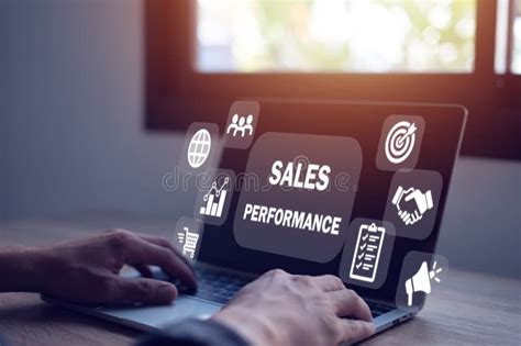 Sales Performance Management Concept Businessman Uses Laptop To Analyze