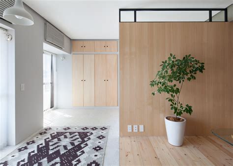 Sinato Hides Bedrooms Behind An L Shaped Wall In Fujigaoka M Apartment