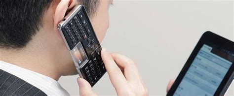 Elecom Bluetooth Keyboard Does The Wireless Handset Jig Too Ubergizmo