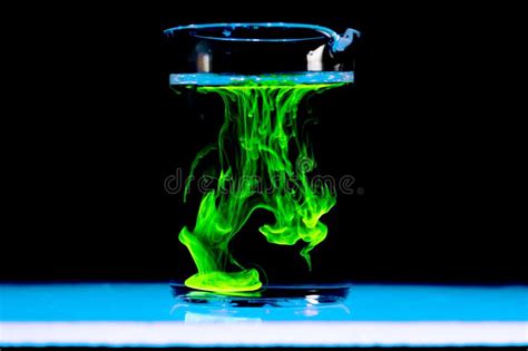 Dissolution And Spread Of A Green Substance In A Flask With A Clear Liquid Stock Image Image