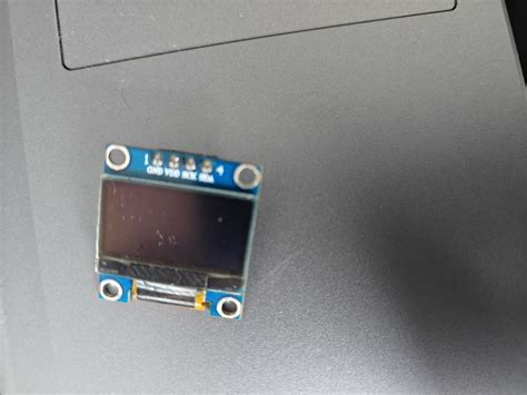 用arduino Nano开发板加一块屏幕i2c接口的ssd1306加ds18b20温度传感器，在屏幕上显示名字和学号还有温度单片机liuxr 讯飞ai开发者社区