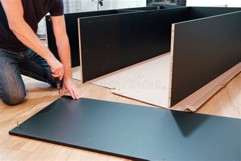 Assembling Furniture Furniture Assembly Worker Assembles Shelf Service Man Assembling