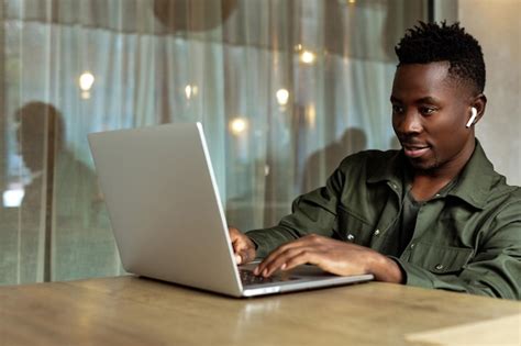 Premium Photo African American Man Using Computer