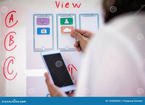 Web Designer Woman Doing Test Sketch Drawing Application For Mobile Phone In Office User
