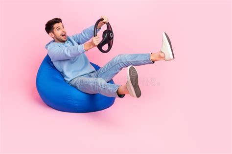 Photo Of Afraid Scared Man Impressed Speed New Car Fast Transport Raise Leg Omg Shock Look Empty