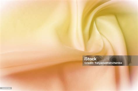 직물의 질감 배경입니다 베이지색 직물입니다 세피아 파스텔 노란색 크림 베이 지 색조에 실크 직물 벽지 질감 배경 패턴 사랑 스러운 천연 실크 질감된 섬유 0명에 대한 스톡