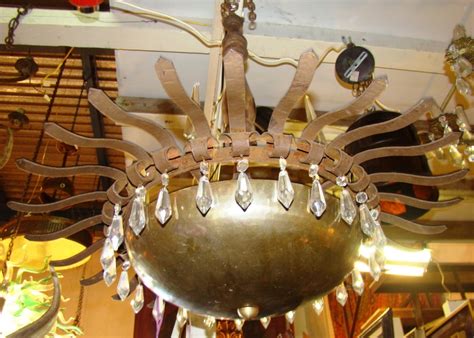 Rustic Iron And Brass Light Fixture In A Sunburst Design Modernism