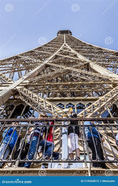 People Watch The Skyline Of Paris From The Upper Platform At The Eiffel