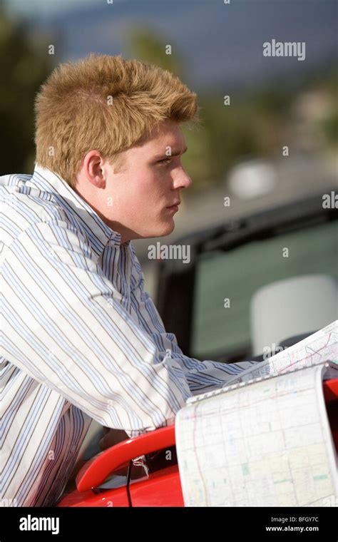 Man Looking At Road Map Stock Photo Alamy