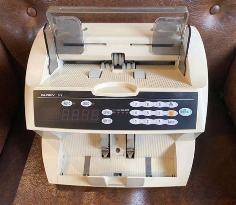 グローリー 紙幣計算機 GLORY 紙幣計数機 紙幣カウンター 小型 中古 のヤフオク落札情報