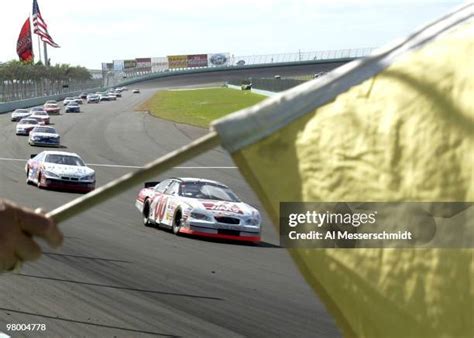 Car Racing Caution Flag Photos And Premium High Res Pictures Getty Images