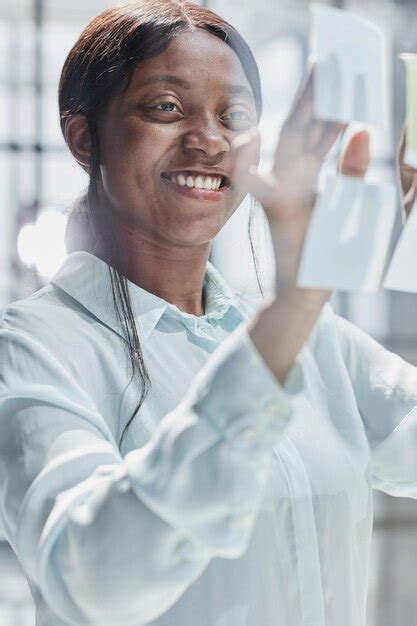 Premium Photo Business People Brainstorming Using Sticky Notes