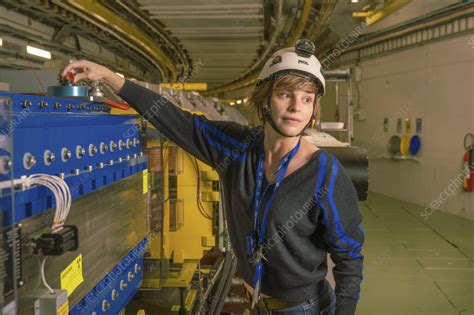 Physicist Positioning Beamline Components At Cern Stock Image C0604486 Science Photo Library