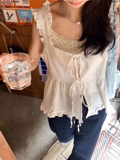 [당일출고 체크 ] 리본 스트랩 프릴 나시 뷔스티에 블라우스 에이블리