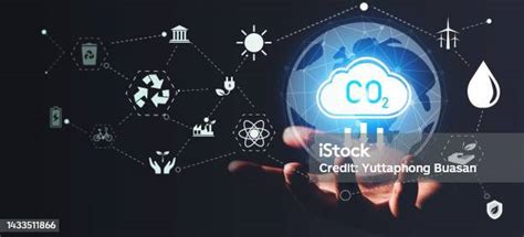 지구 온난화를 제한하기 위해 Co2 배출량 탄소 발자국 기후 변화를 줄이기 위해 가상 현대 지구를 보유한 사업가 지속 가능한 개발 및 혁신 녹색 비즈니스 개념 기후 묘사에