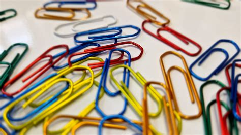 Paperclip On Paper Metal Paperclip Attached To White Paper Royalty