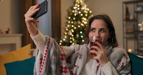 A Girl Spends Lonely Winter Evening Dressed In Blanket The Influencer Takes Selfie With Phone