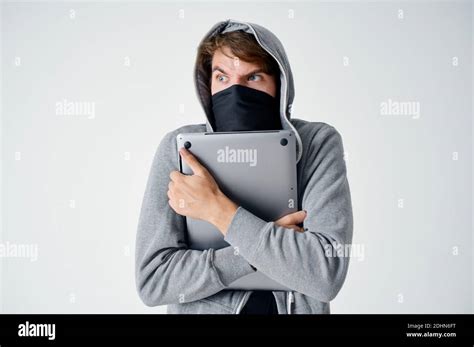 Secretive Masked Man Laptop Hacker Penetration Danger Stock Photo Alamy