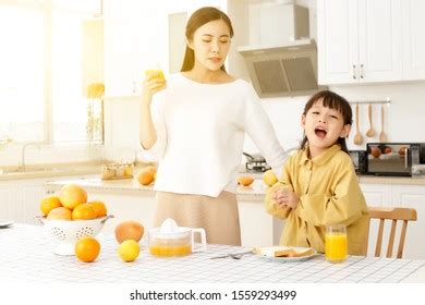 Girl Naughty Mom Freshly Squeezed Juice Stock Photo Shutterstock