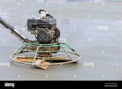 This Process Entails Polishing And Leveling Cement Screed Mortar Floors