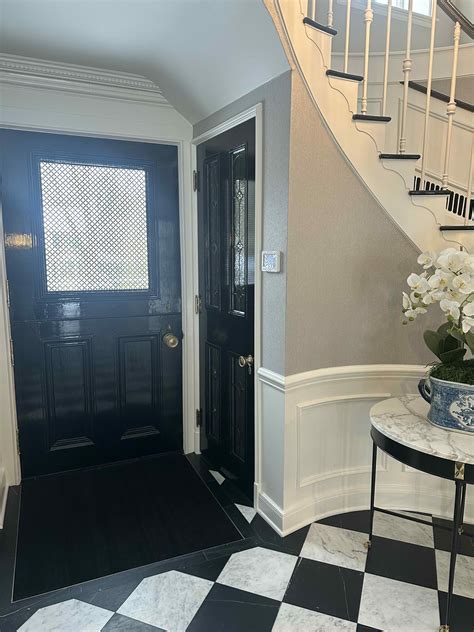 Elegant Clear And Beveled Glass Inserts Installed In Entry Door
