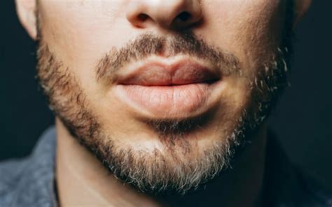 Premium Photo Male Mouth In Evidence With A Sparse Beard