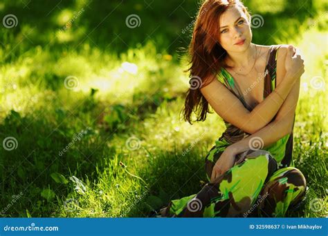 Brunette Sitting On Green Grass Stock Image Image Of Attractive