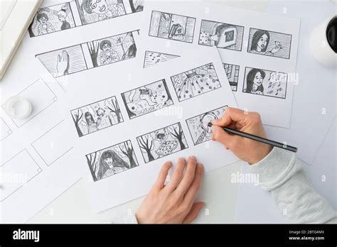 Hands Of The Artist Draw A Storyboard On Paper Storytelling Story