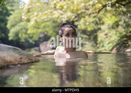 Woman Bathing In Outdoor Onsen Hot Spring At Myoken Ishikaraso