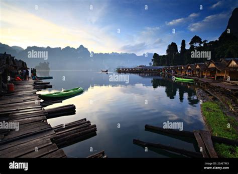 Floating Raft House Reflection On Water In Khao Sok National Park Surat