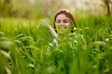 Silhouette Of A Woman Walking In Tall Grass Photo Out Of Focus Stock