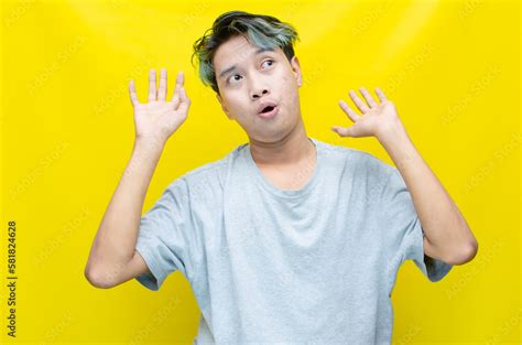 Crazy Happy Asian Man With Funny Hairstyle Making Grimace Silly Funny