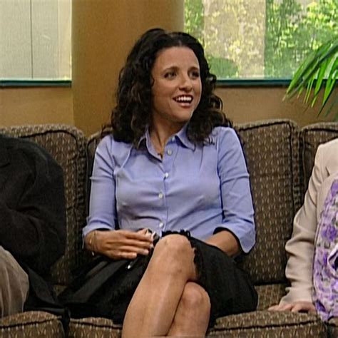 Three People Sitting On A Couch Talking To Each Other