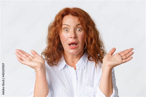 People Emotions And Lifestyle Concept Close Up Of Confused And Shocked Redhead Woman Cant
