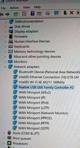 Планшет Latitude 7230 Rugged Extreme подключенный к стыковочной станции Wd22tb4 Thunderbolt