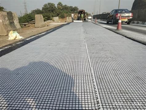 Asphalt Reinforcement Grid At Best Price In Gurugram By Ooms Polymer Modified Bitumen Private