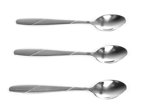 Premium Photo Three Silver Spoons Isolated On White