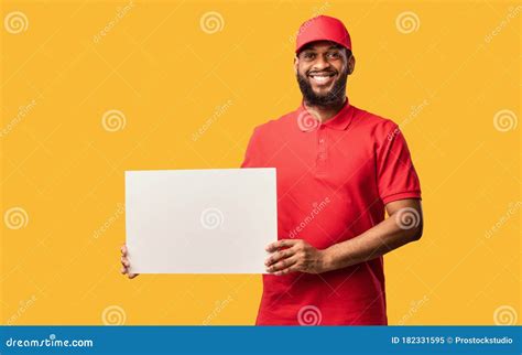 African Delivery Guy Showing Empty White Poster Yellow Background