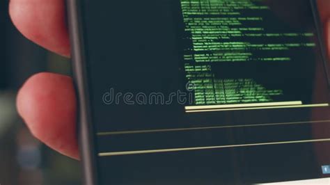 Secure Contain Protect Hacker Working On A Code On Mobile Phone Compiling Nodes Stock