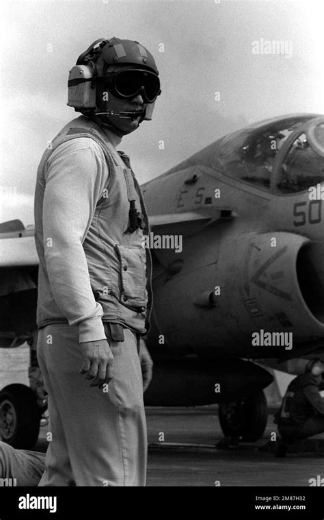 A Waist Catapult Officer Observes Flight Operations Aboard The Aircraft